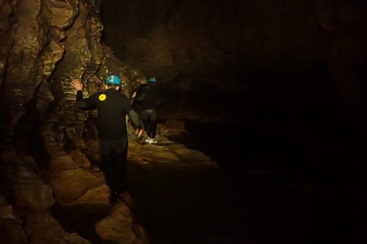 Into the Abyss: Black Water Rafting at the Waitomo Caves - Migrating Miss